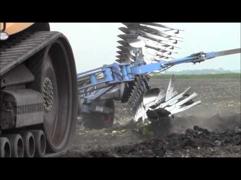 Cat MT 865 C ploughin with lemekin.wvm - YouTube