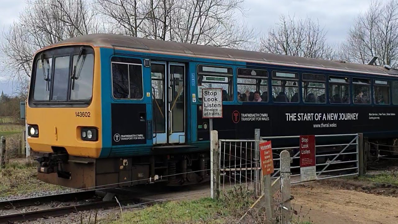 TfW Class 143 'Pacer' 143602 at Castor Level Crossing (NVR) - YouTube
