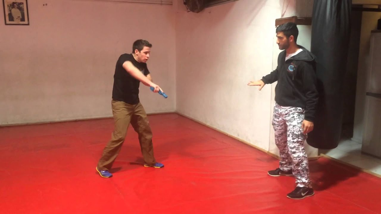 Krav Maga Pistol Disarm from the Front - YouTube