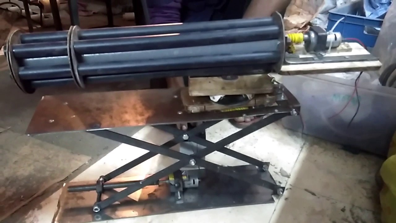Lifting and rotating of gun mechanism ( scissor mechanism) - YouTube
