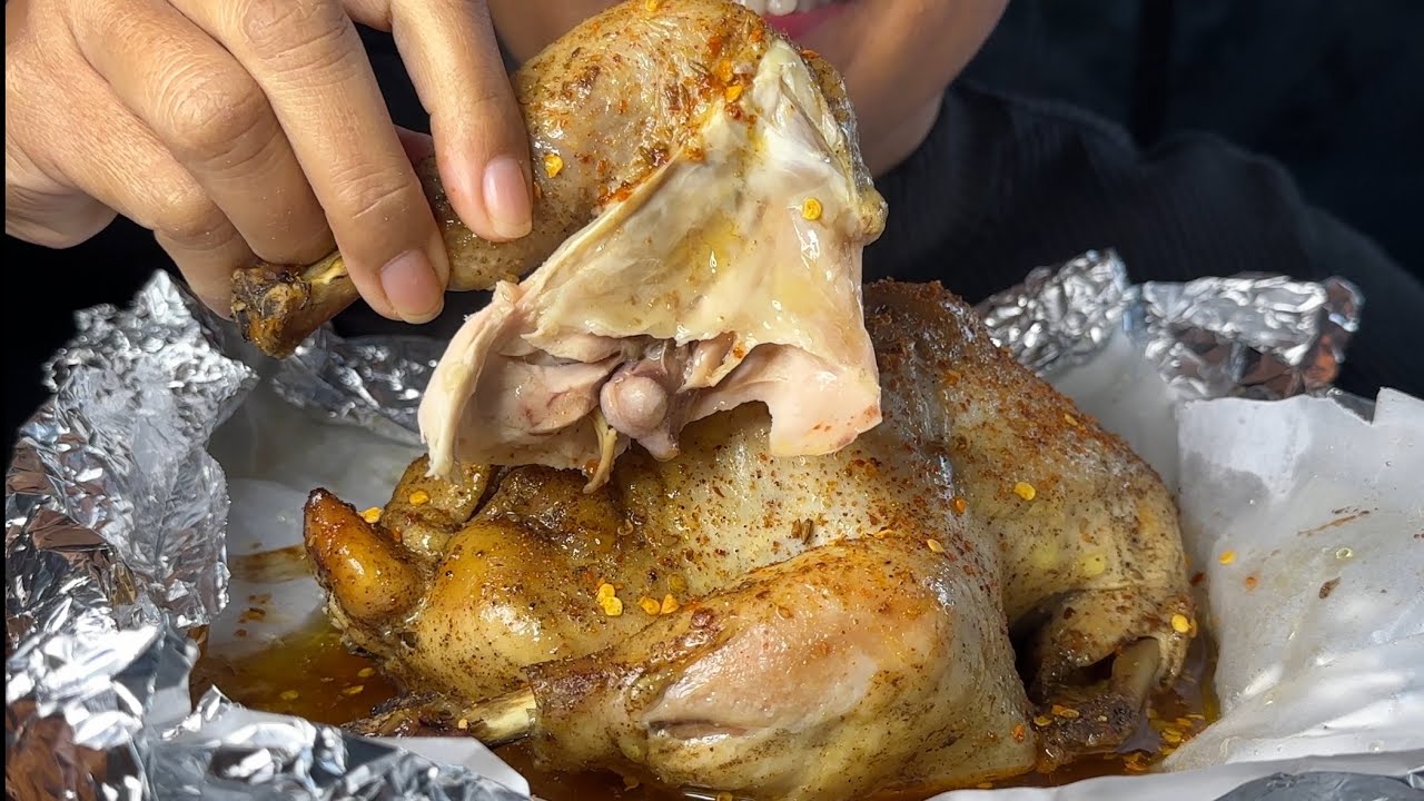 Eating Baked whole chicken , the juicy delicious chicken with no ...