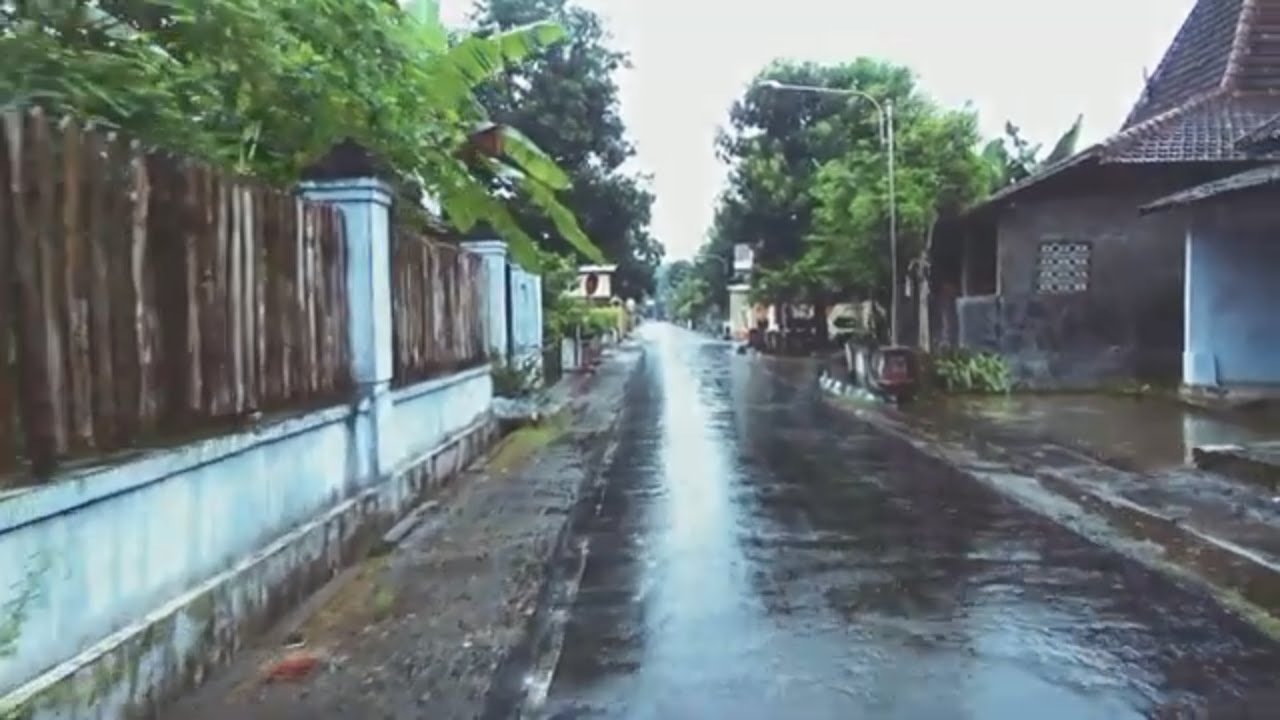 Rainy atmosphere in the village cycling with an umbrella - YouTube