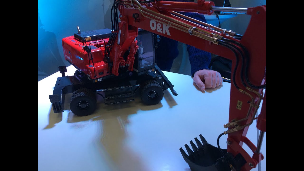 Wheeled Excavator Damitz MH 6.6 - YouTube