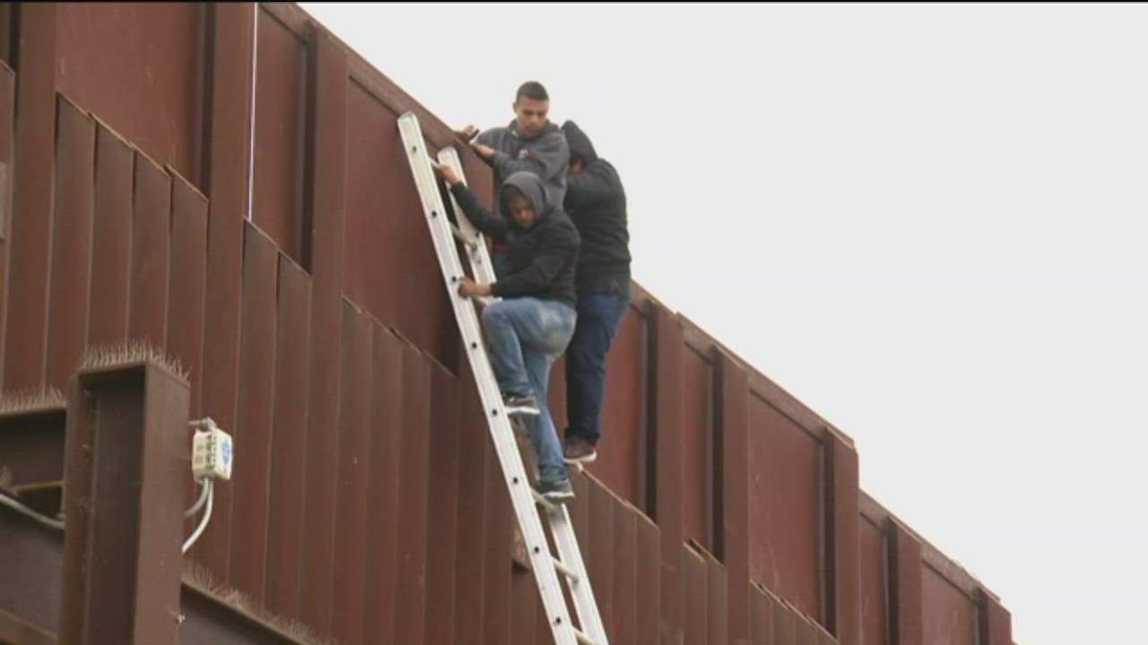 CBP rescue at least 3 people stuck on border wall in Otay Mesa - YouTube