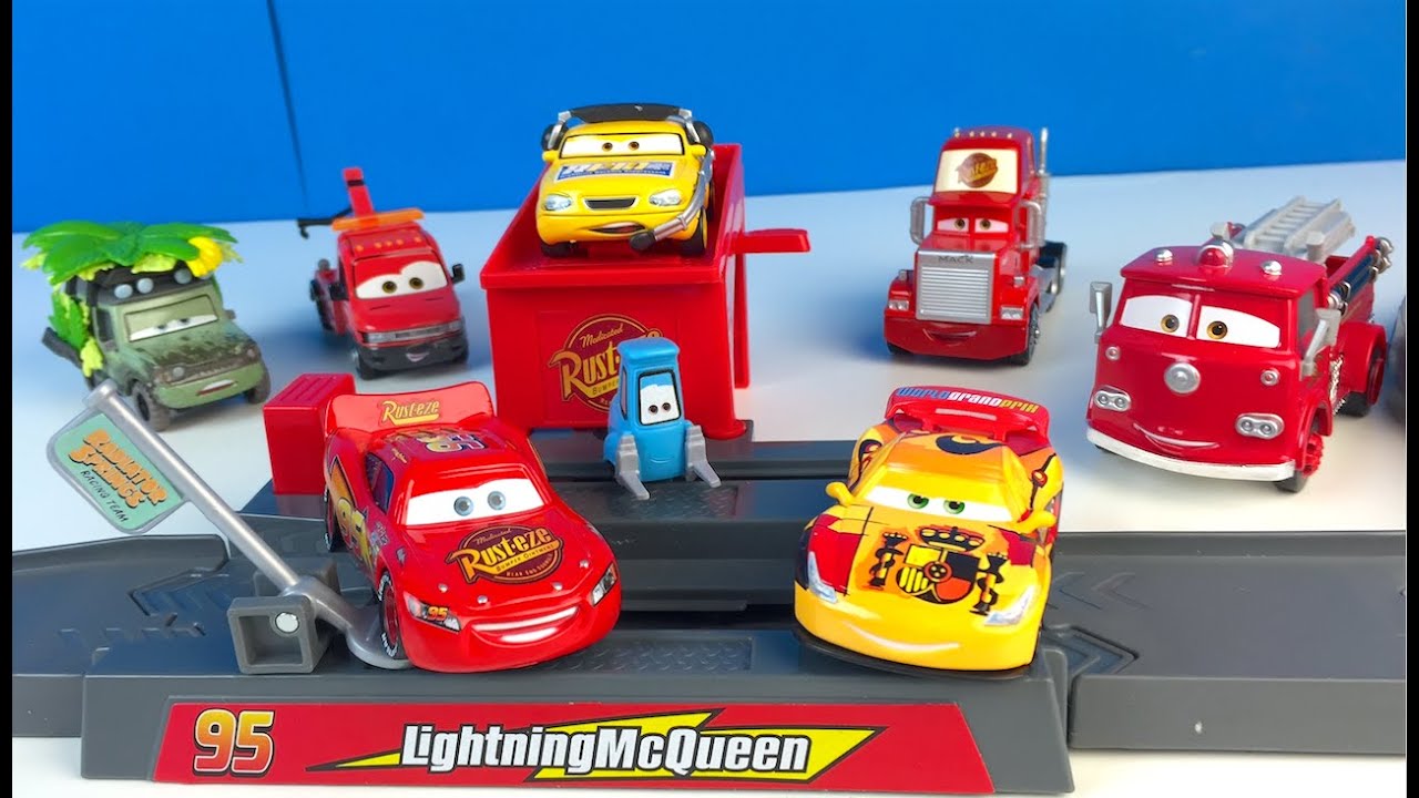 UNBOXING DISNEY CARS PART 2 - LIGHTNING MCQUEEN MIGUEL CAMINO MACK SEMI ...