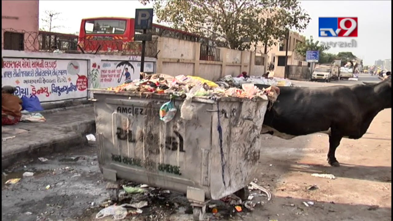 AMC slapped fine to units throwing garbage on road | Tv9GujaratiNews ...
