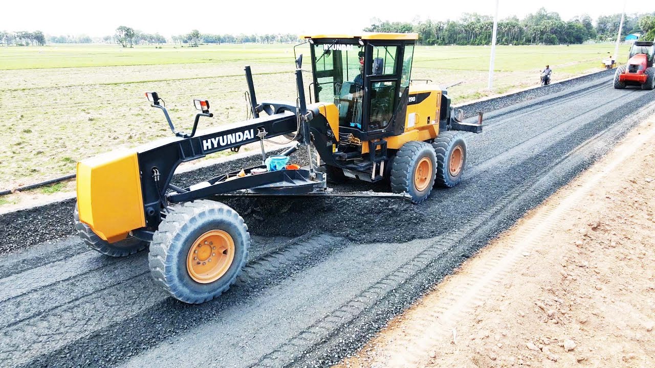 Best Activities Operator Motor Grader Spreading Black Gravel Building ...