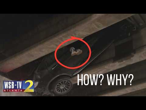 MAN DANGLING AS CAR IS WEDGED IN I-20 OVERPASS