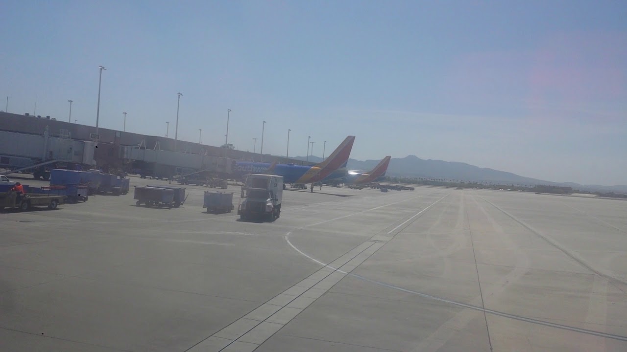 Southwest Airlines Flight 192 slowly stops at the gate at Las Vegas ...