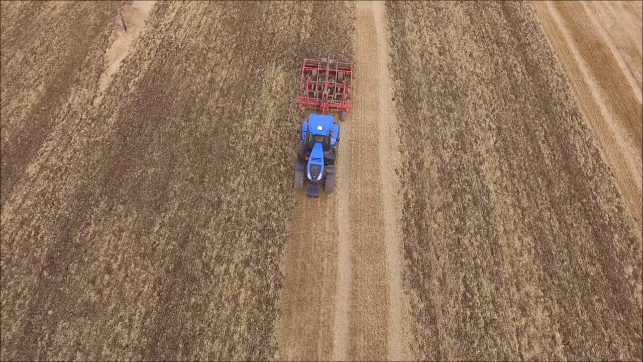 Tractor in field and using follow me mode - YouTube