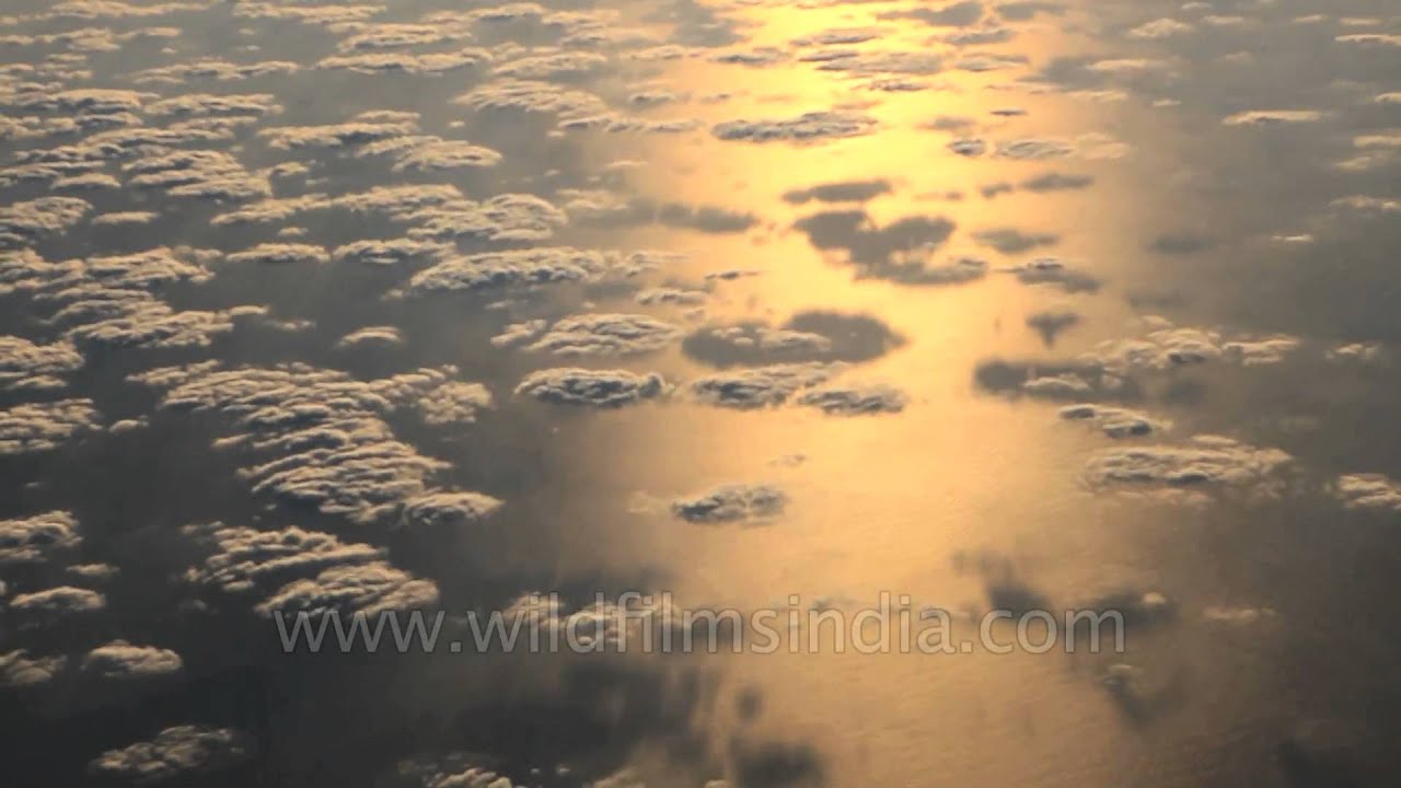 Flying over wispy clouds - Strait of Malacca - YouTube