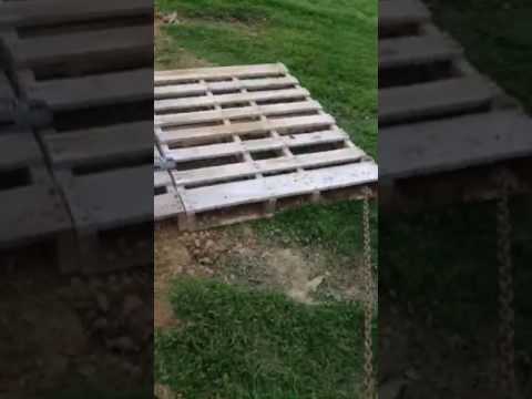 Leveling the yard with pallets - YouTube