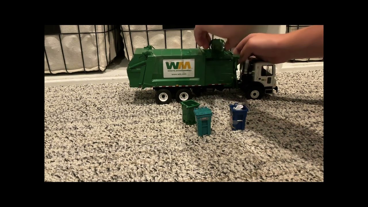 Front loader side loader picking up wheeless pins - YouTube