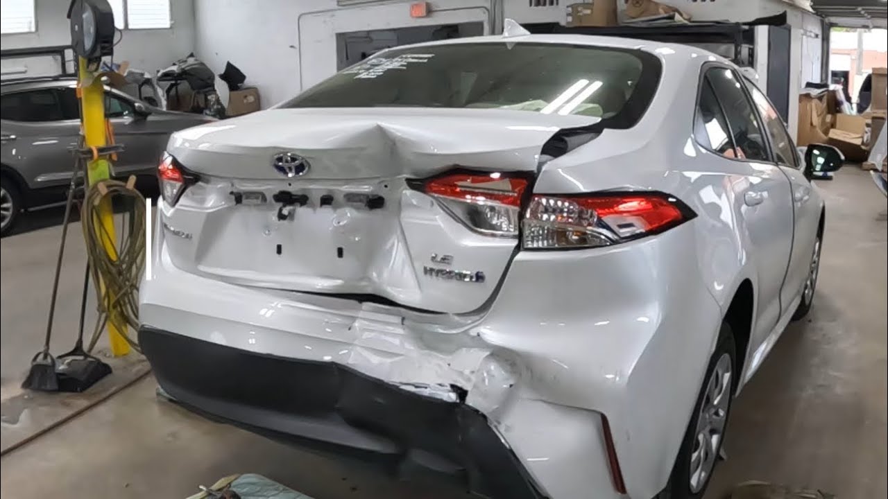 How to replace and bondo repair a badly damaged Toyota Corolla rear ...
