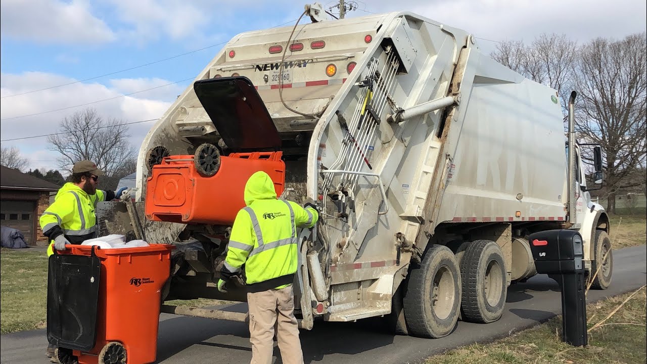 Red River Disposal New Way Rear Loader Garbage Truck on a County Route ...