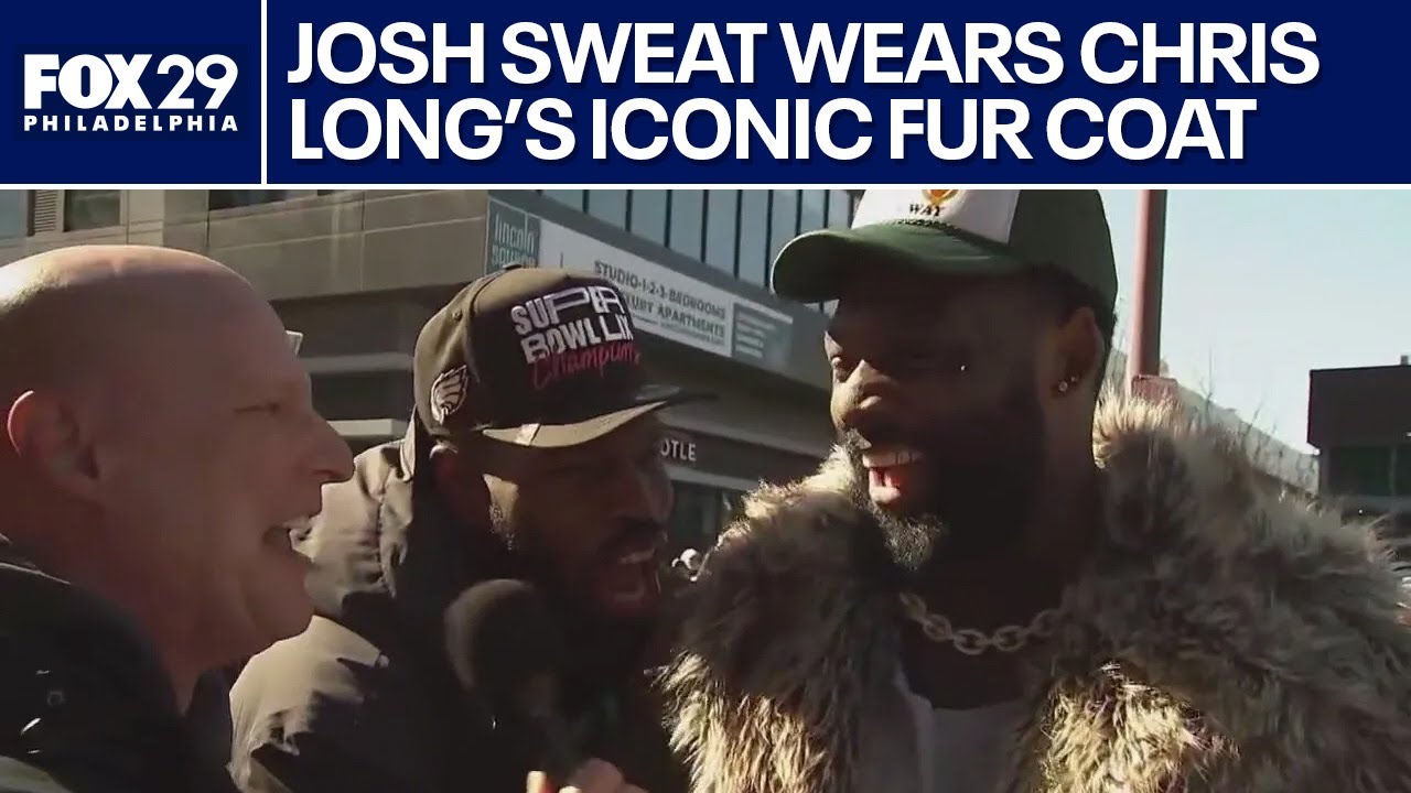 Josh Sweat rocks Chris Long's fur coat from Super Bowl LII parade - YouTube