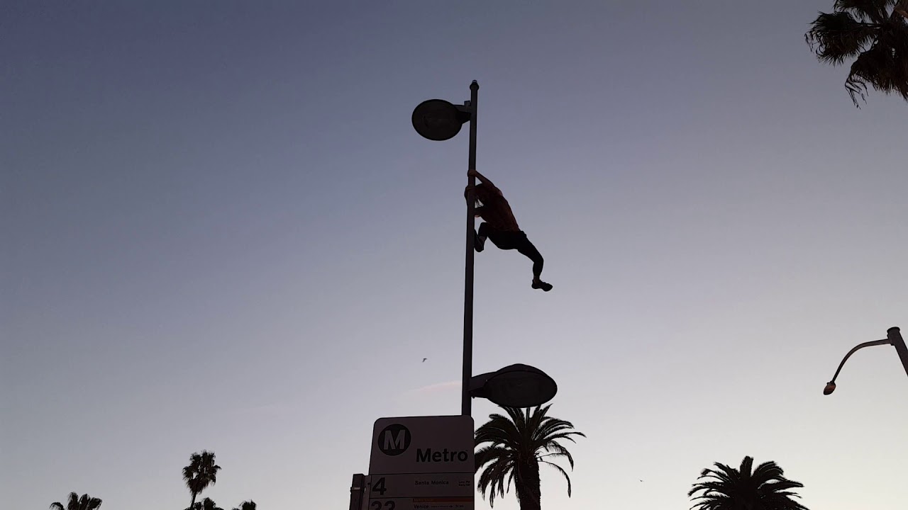 Santa Monica Light Pole Climber - YouTube
