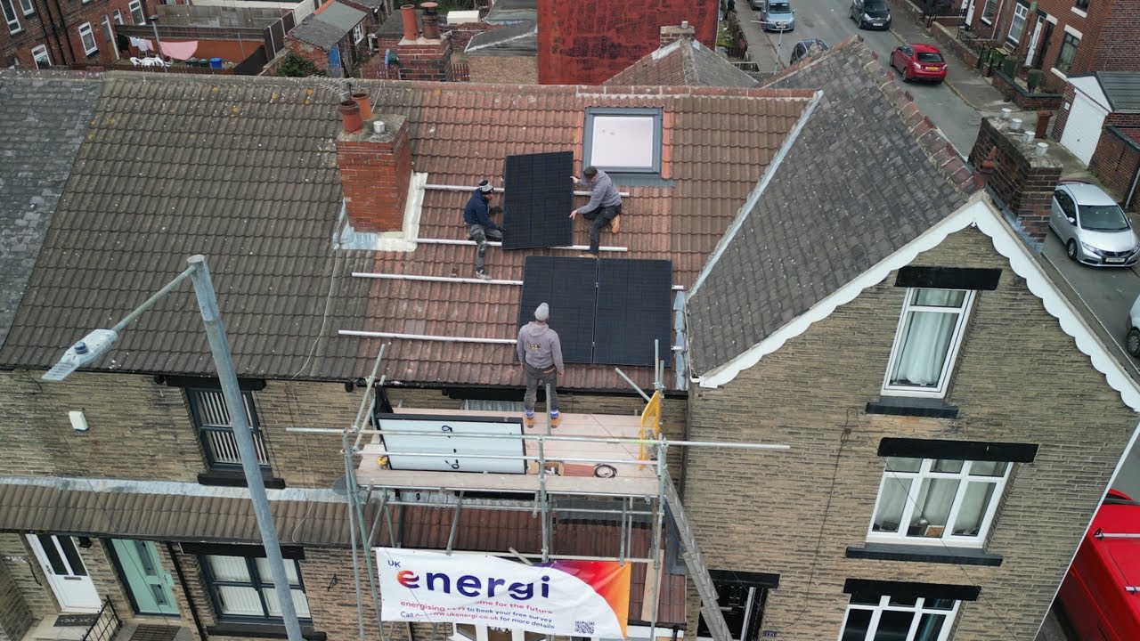 Professional mid terrace solar panel installation - YouTube