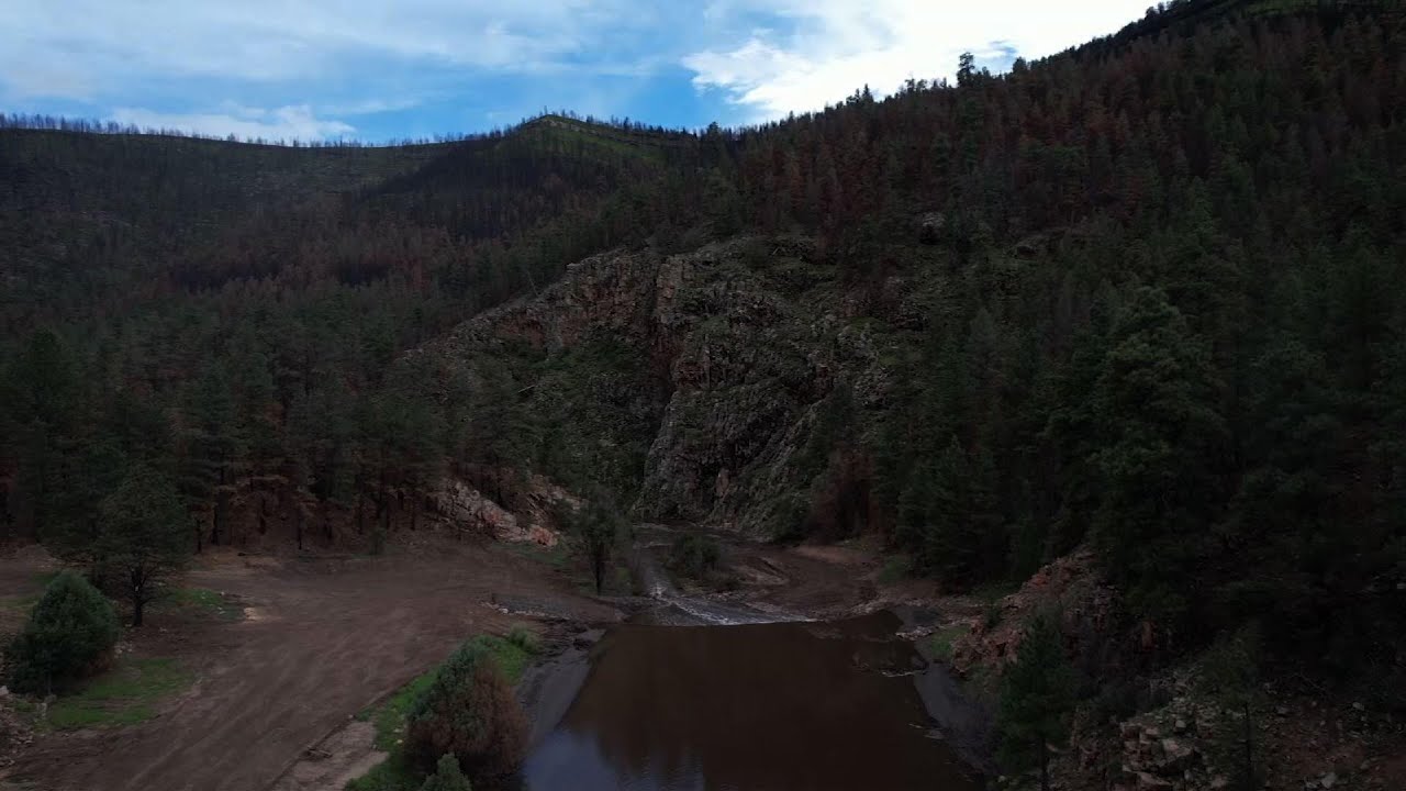 Fire, flood threaten city's drinking water - YouTube