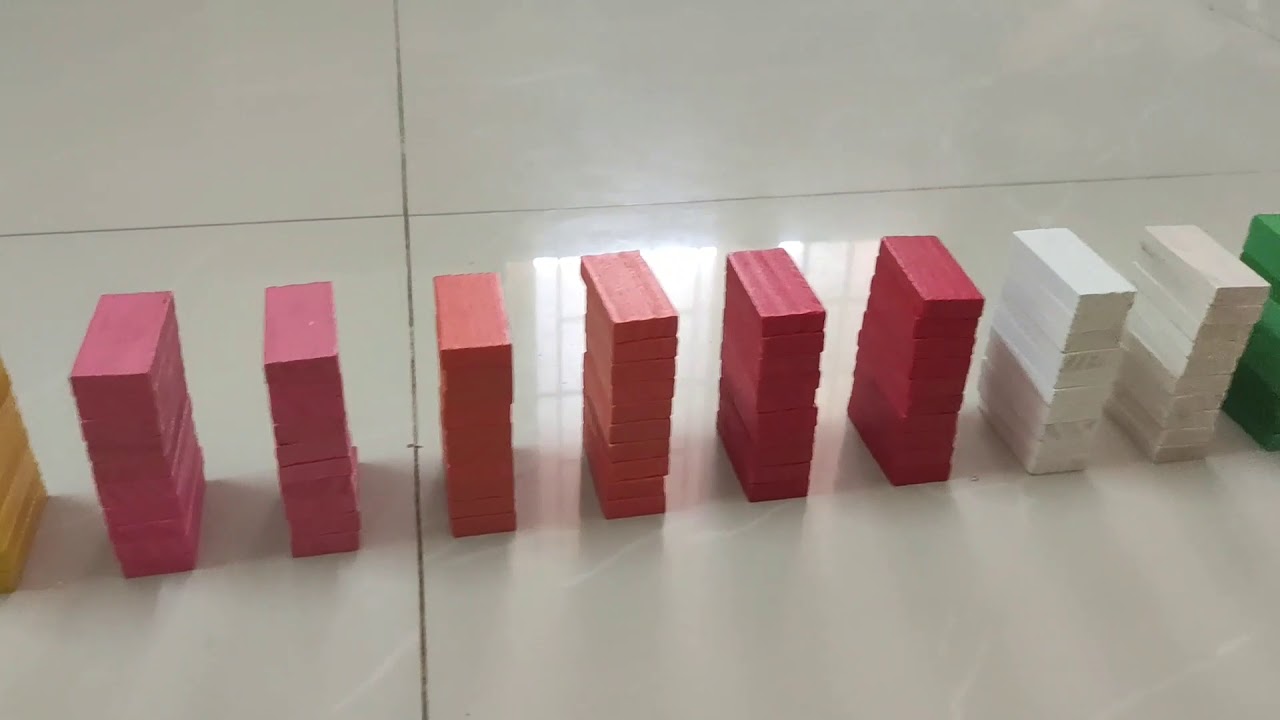 Stacking dominoes trick - YouTube