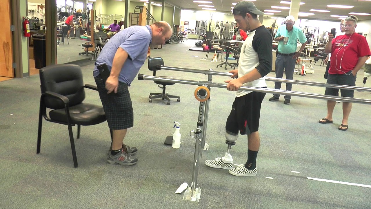 Derek's first steps on BK prosthesis - YouTube