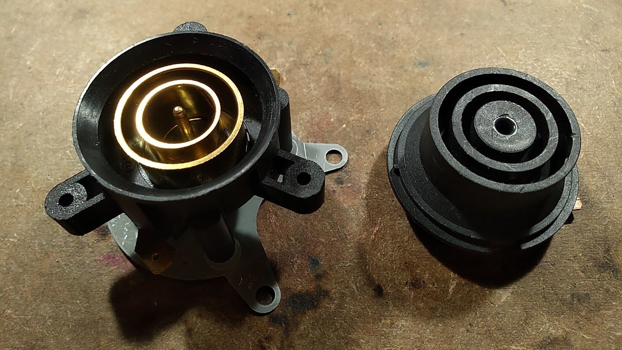 A close look at the sliding contacts in a cordless appliance base ...