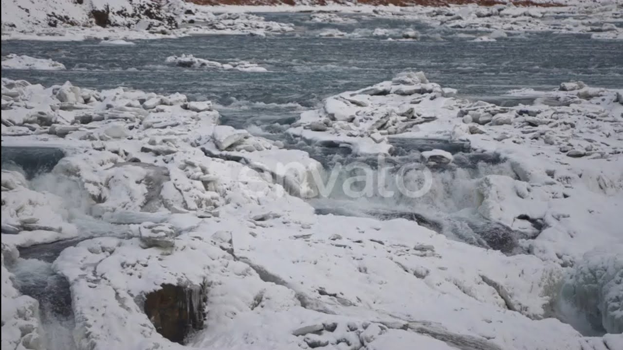"Ice Veil Unveiled: Capturing the Mystique of a Half-Frozen Waterfall ...