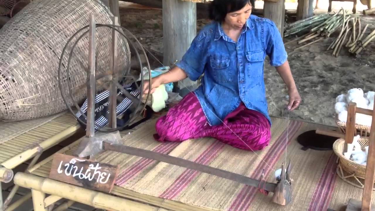 Silk spinning - traditional method - YouTube
