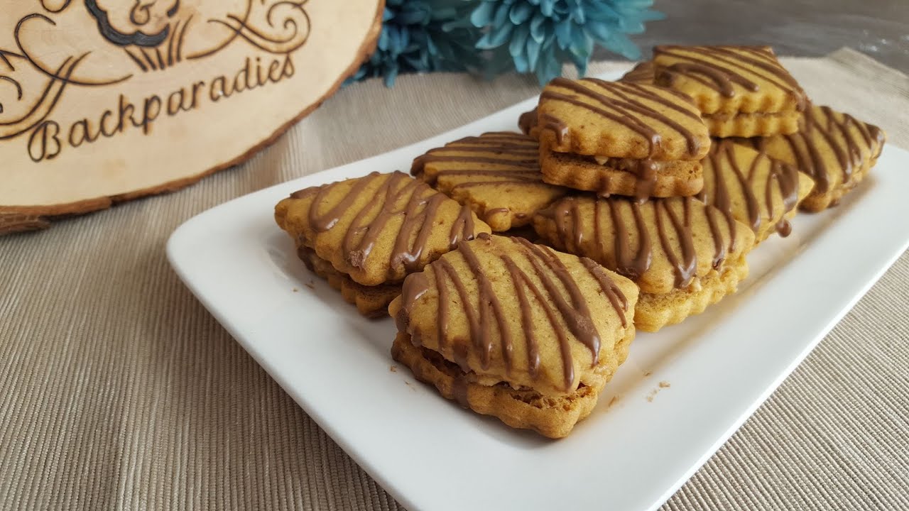 Kekse mit feiner Nussfüllung, genau für die Weihnachtszeit 👌 Cookies ...