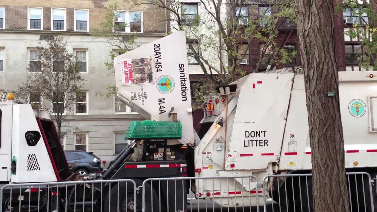 RARELY SEEN PROCEDURE OF A DSNY STREET SWEEPER EMPTYING CONTENT INTO A ...