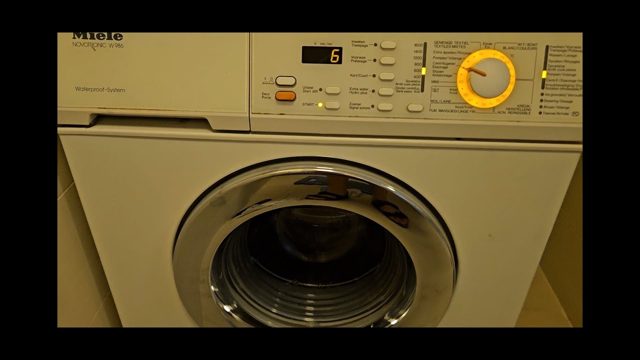 How to replace the distribution v-belt on a Miele W986 washing machine ...