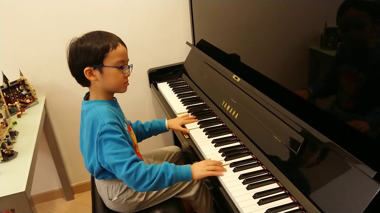 Mozart Sonata in A K331 (Movement 1) by Jonah Ho (age 7) - YouTube