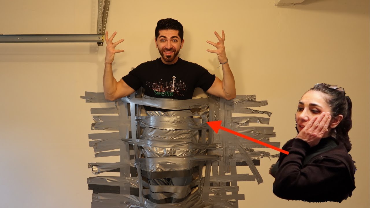 Duct taping myself against wall prank on mom - YouTube