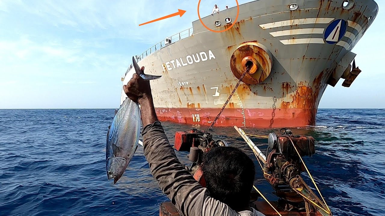 FISH OFFERED TO SHIP OFFICERS WHILE FISHING - YouTube