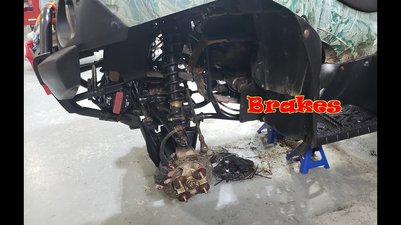 Kawasaki Brute Force 750 ATV front brake pads replace - YouTube