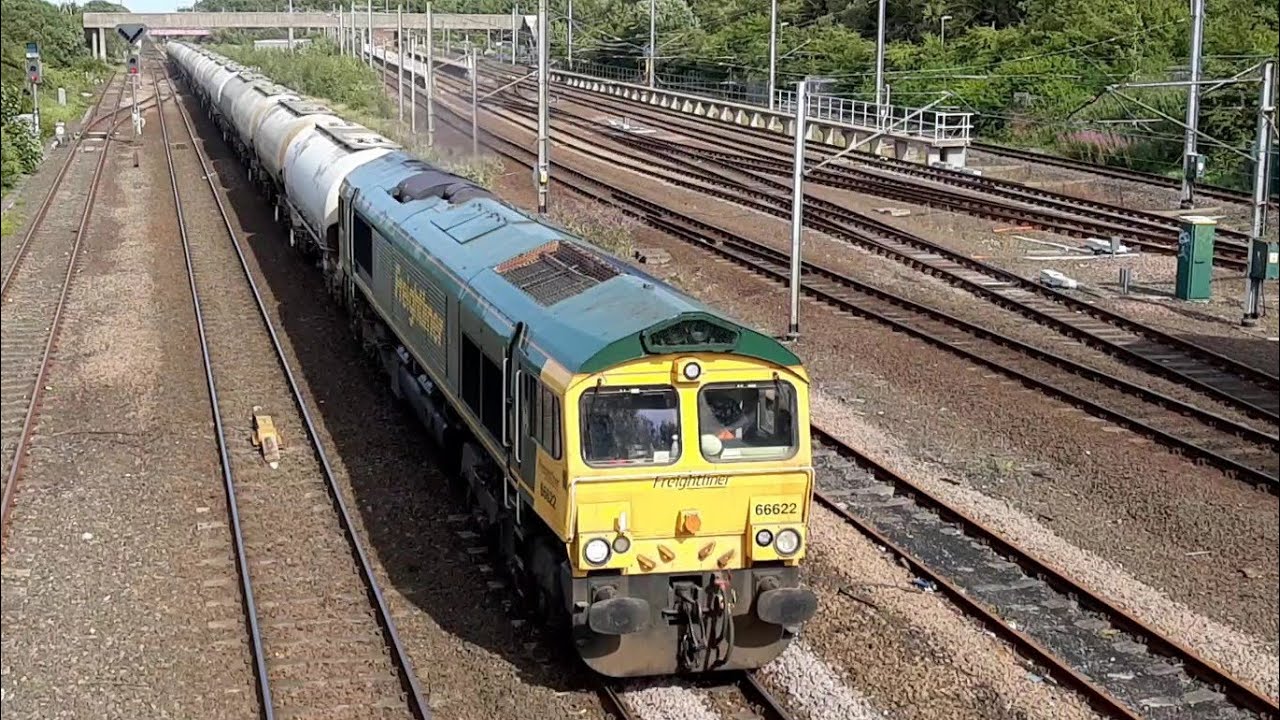 Seaham cement train passes Pelaw Metro Station - YouTube
