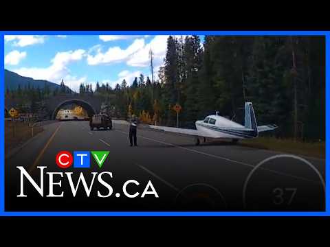 Plane lands on Trans-Canada Highway in Banff National Park