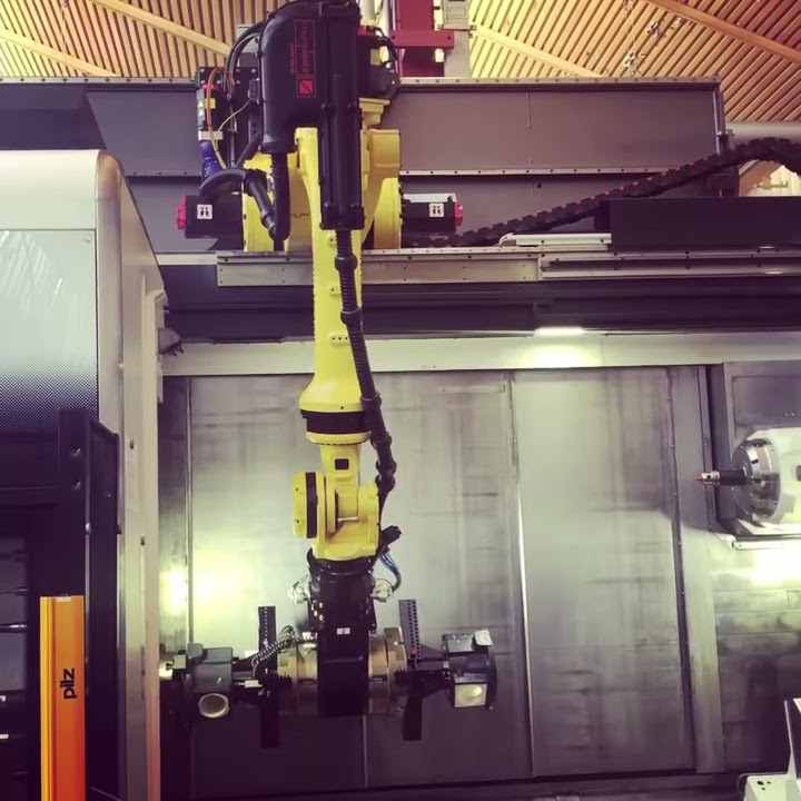 10181 large cnc machine tending robot with centric gripper - YouTube