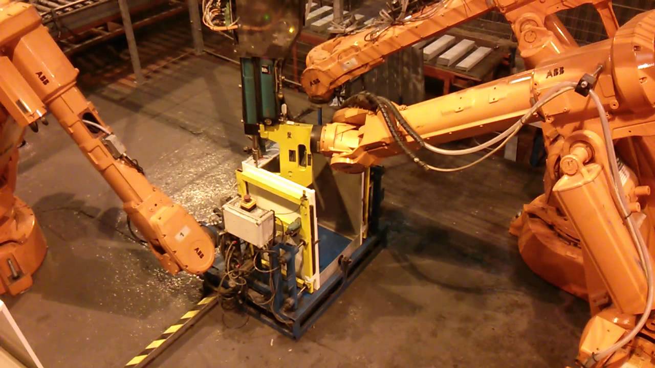 3 x IRB 6000 ABB robots with TOX Clinch - YouTube