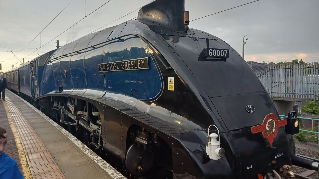 Sir Nigel Gresley locomotive 60007 departs Warrington BQ with a whistle ...