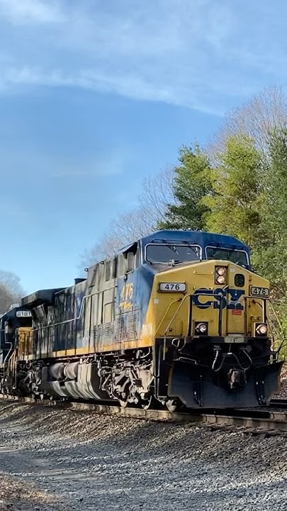 CSX #476 screaming uphill in the lead of train M426 with consecutive #477 trailing and SD40 ...