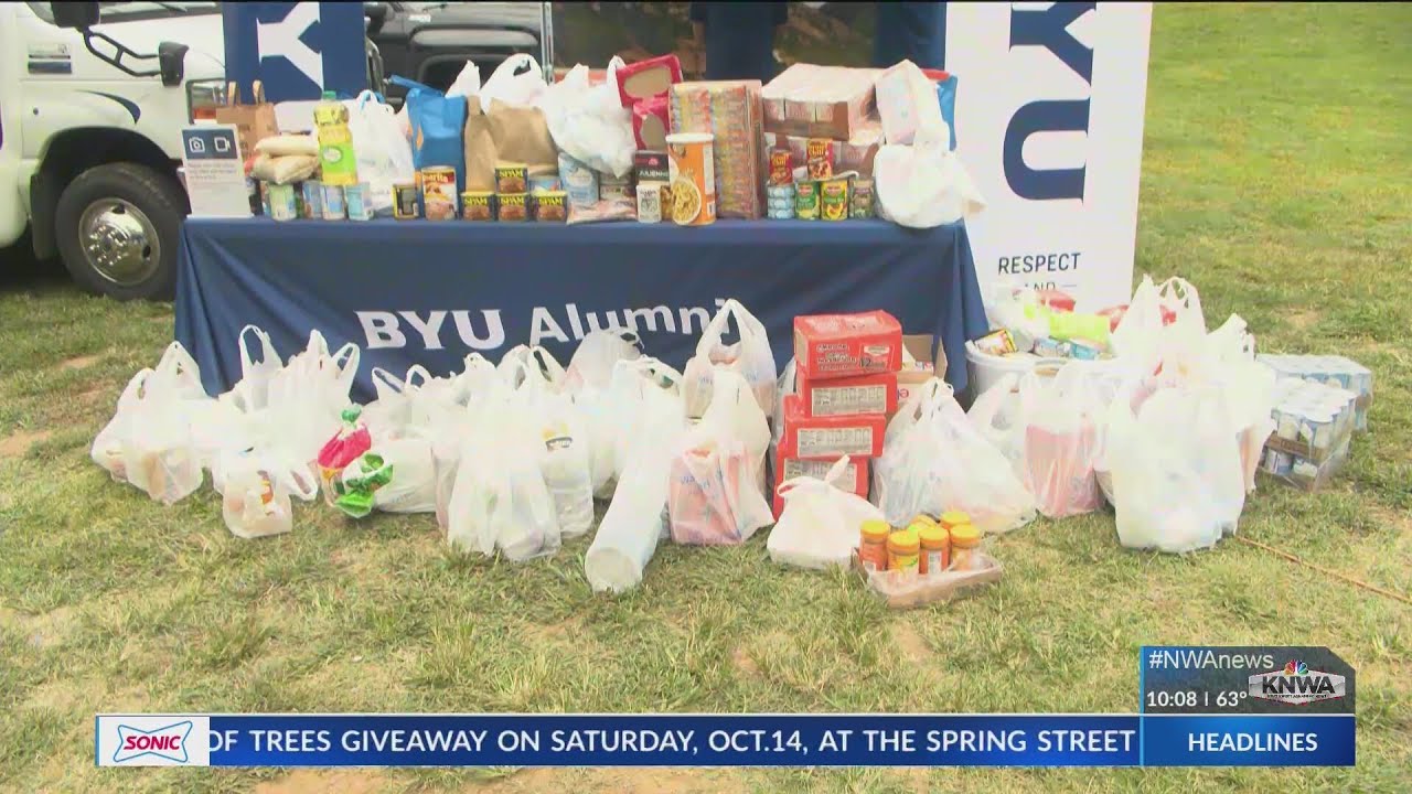 Food donations at BYU's tailgate in Fayetteville - YouTube