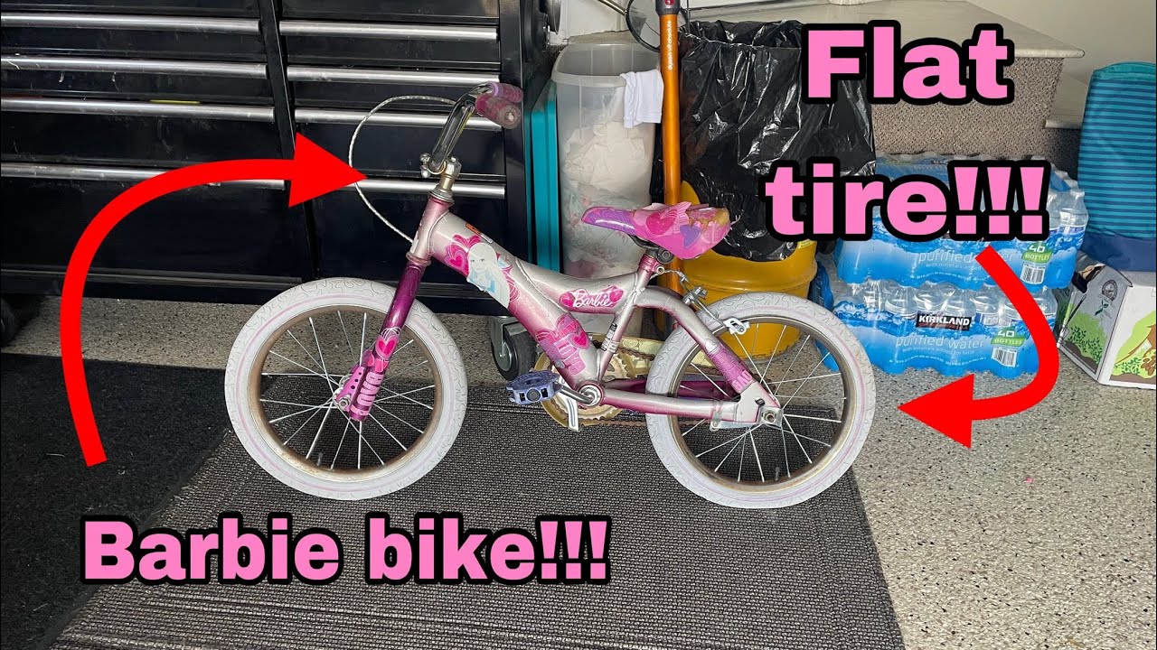 Fixing a tire on an old barbie bike for my cousins!!! - YouTube