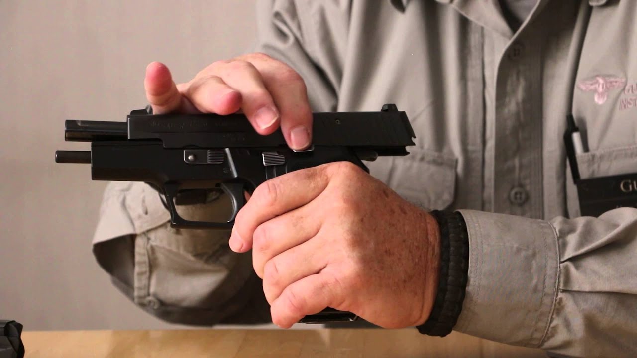 Left handed manipulation of a Sig Sauer - YouTube