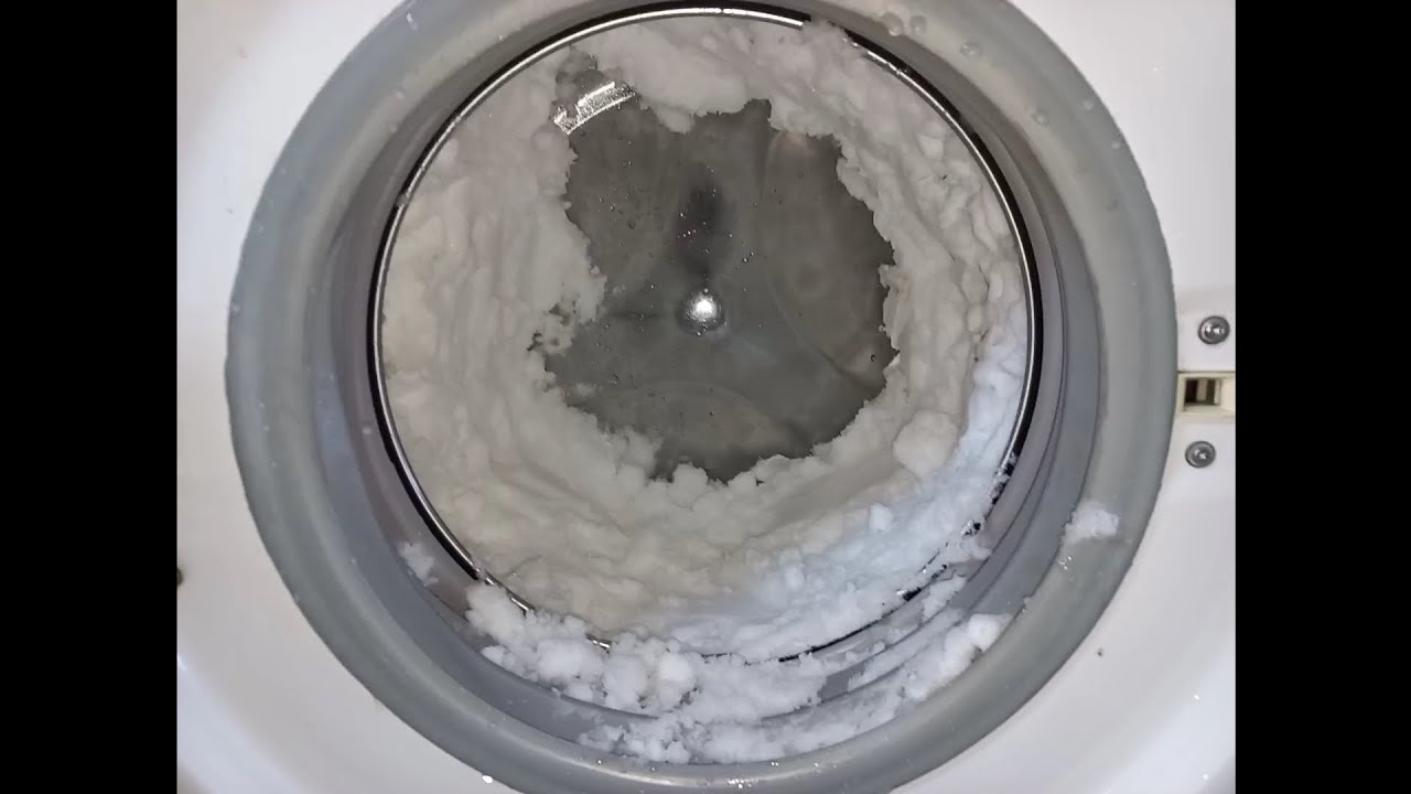 Throwing snow in Whirlpool washing machine at 600 rpm spin - YouTube