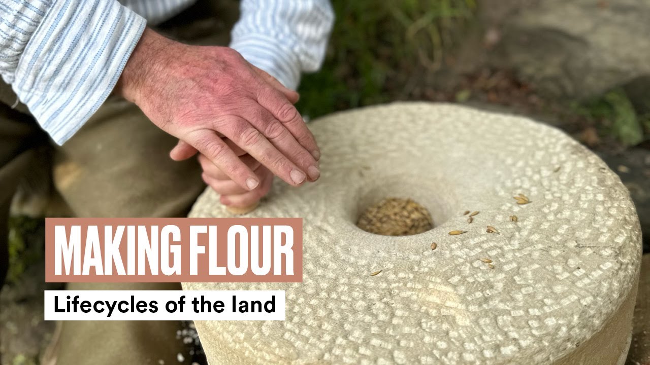 Making flour using a quern at the Ulster Folk Museum - YouTube
