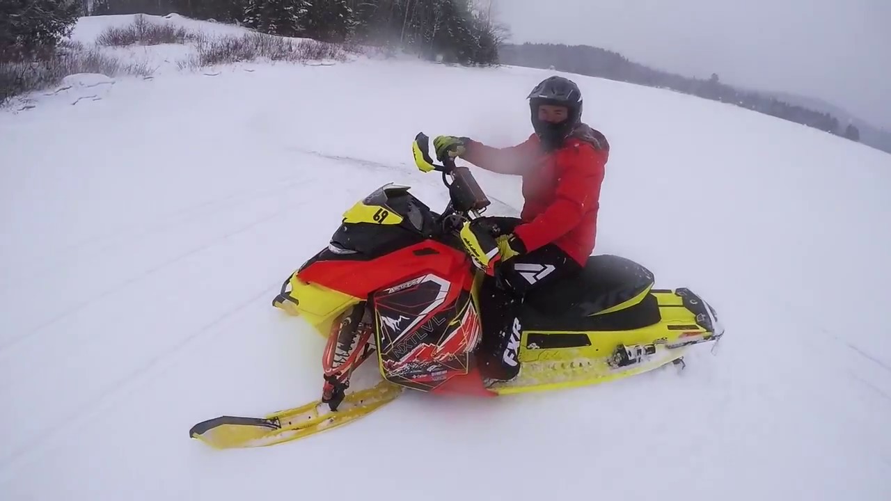 Skiing behind snowmobile - YouTube