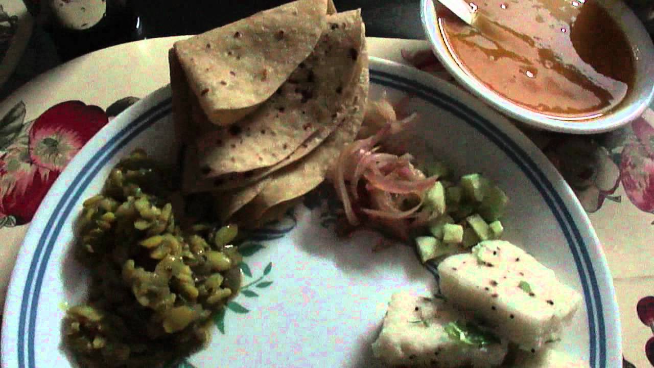 Bateta Shak, Vaal, Rotli, Onion and Cucumber Salad, Dhokla, Patoori ...