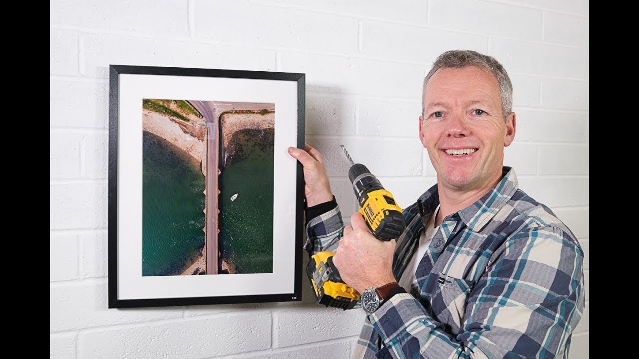 Hang Pictures On Your Wall In Under 5 Minutes With These Simple Tips ...