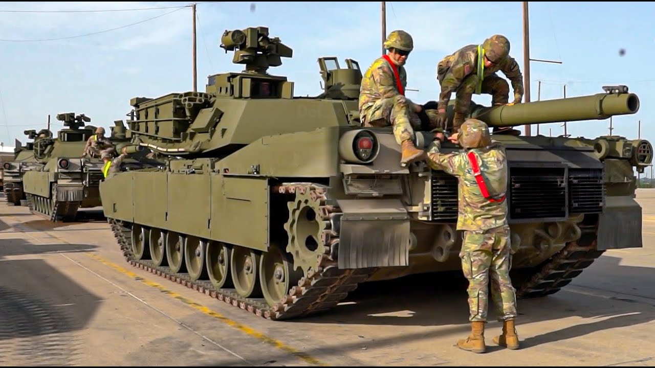 U.S. Army • Soldiers Load Massive Convoy of Military Vehicles Onto Rail ...
